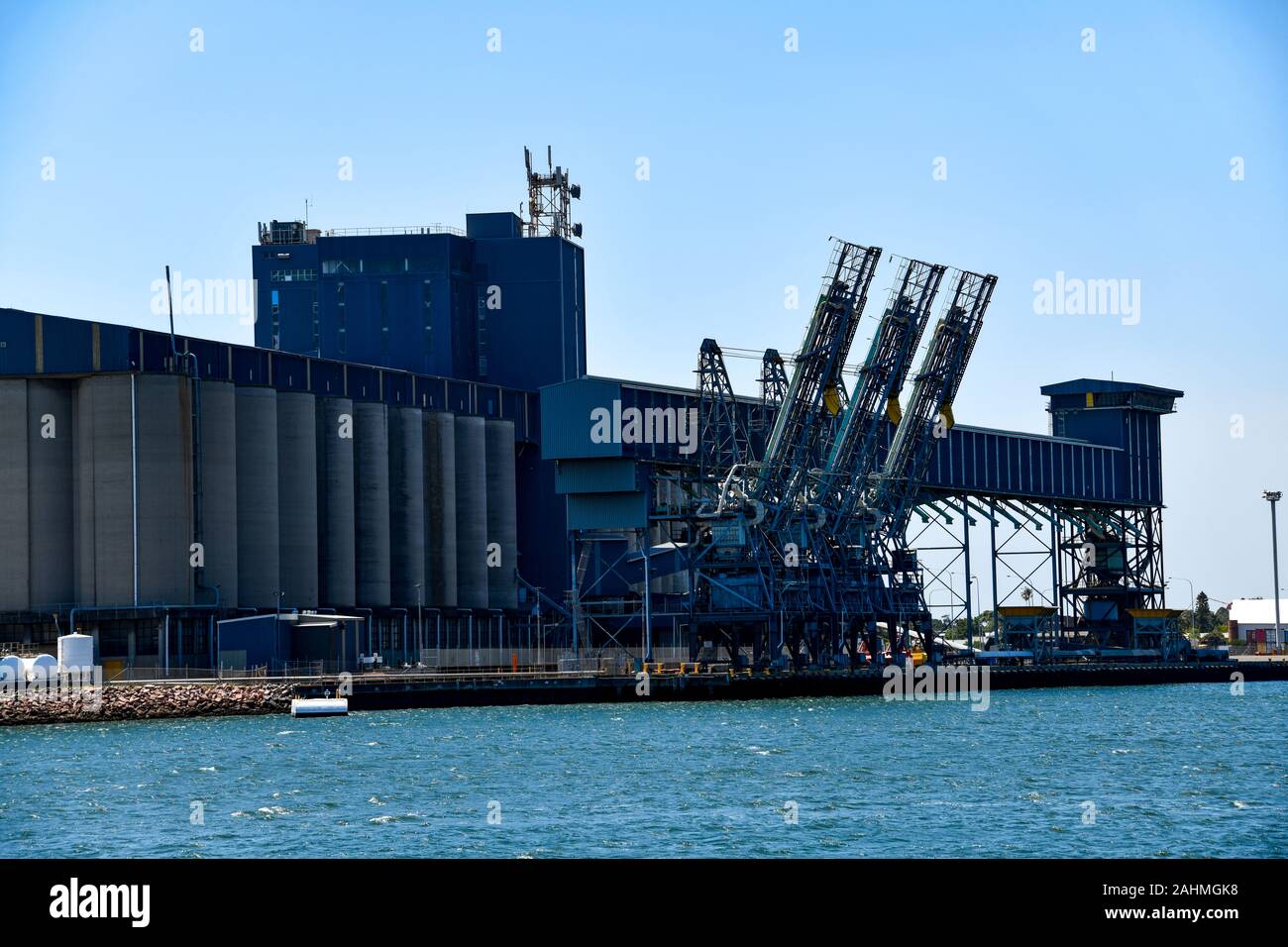 Grain Silos and Wharf Ship Loading Cranes at Port of Newcastle Stock ...