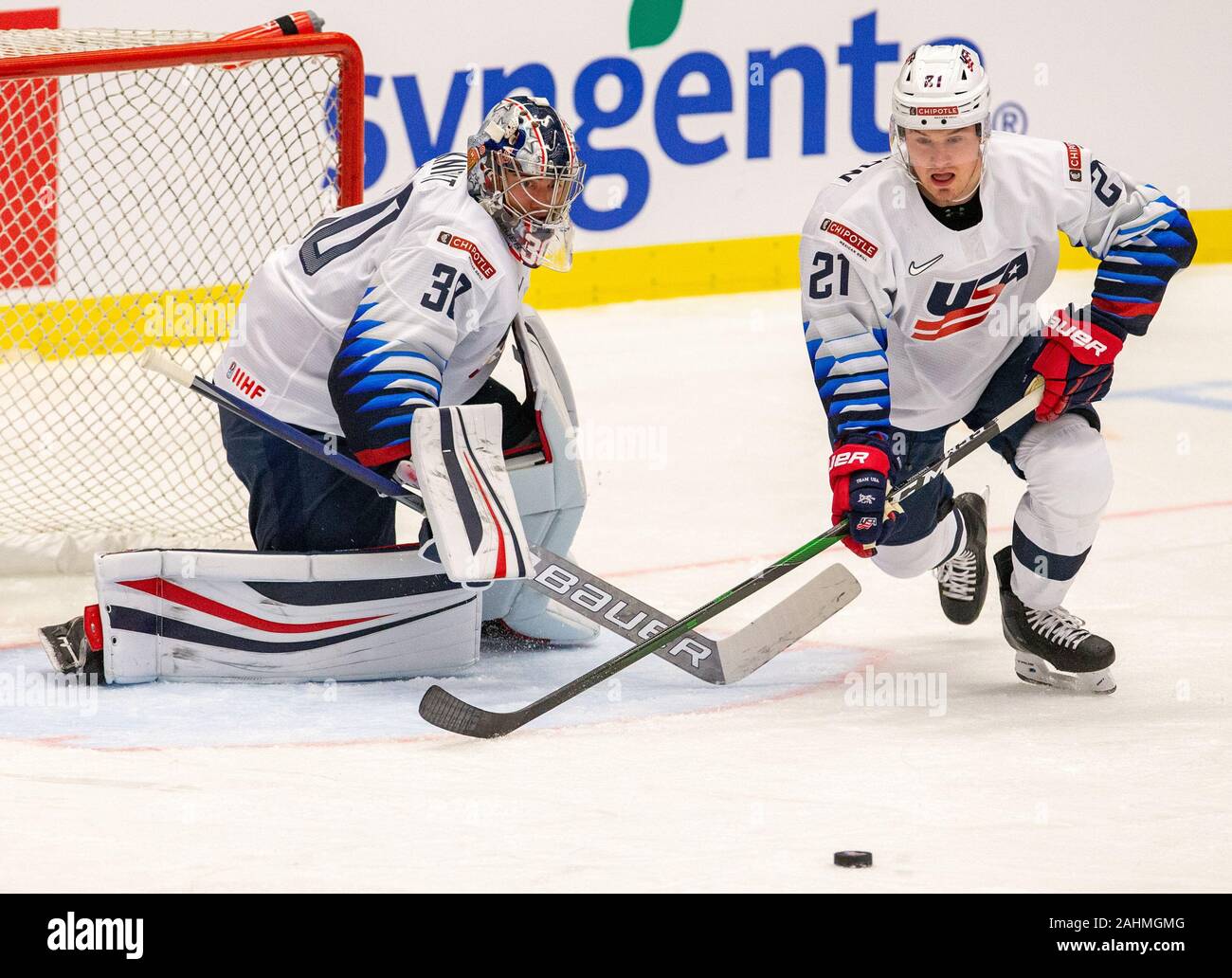 L-R Goalkeeper Spencer Knight and Ty Emberson (both USA) in action during the 2020 IIHF World ...