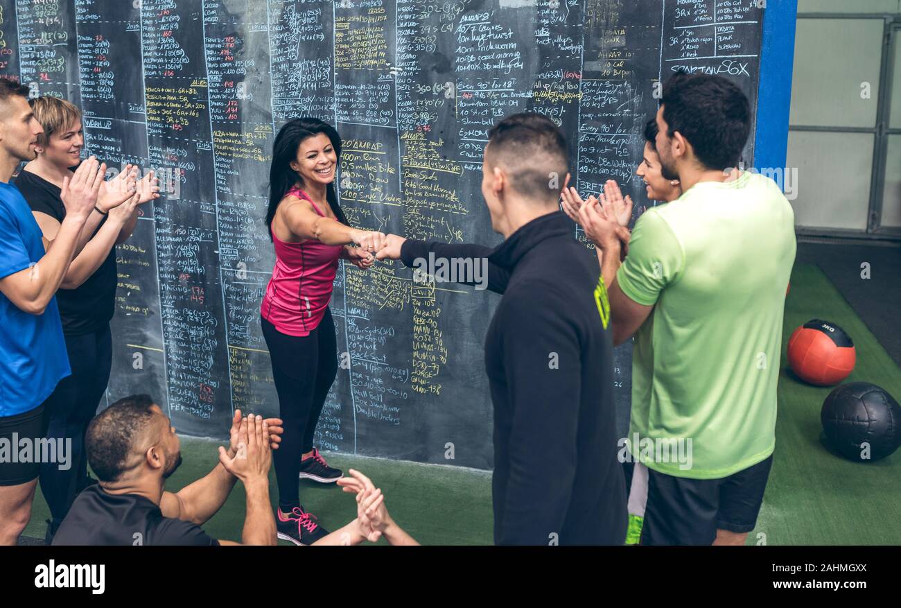 Male coach clapping athlete hi-res stock photography and images - Alamy