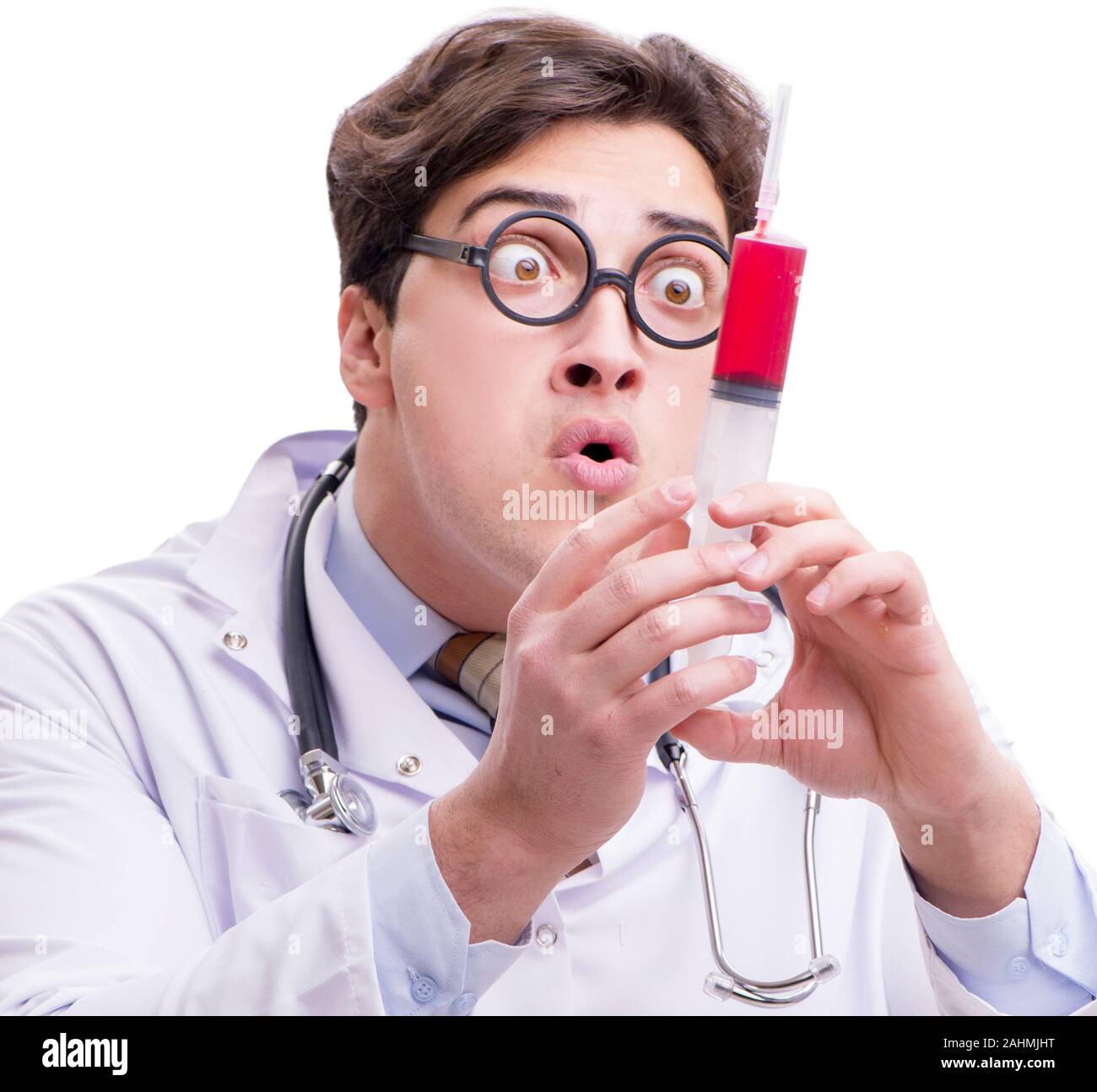 The funny doctor with syringe isolated on white Stock Photo - Alamy