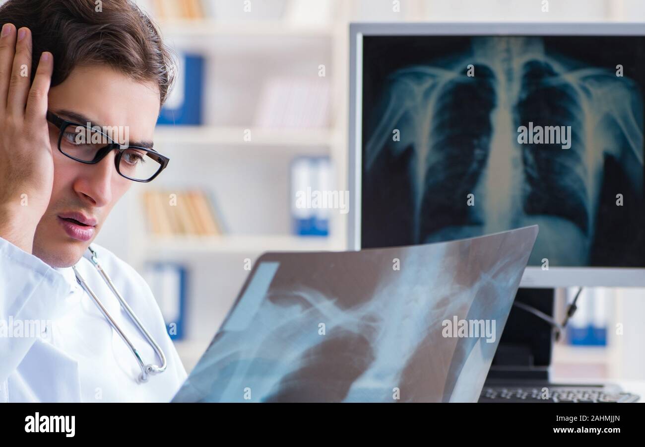 The doctor radiologist looking at x-ray images Stock Photo - Alamy