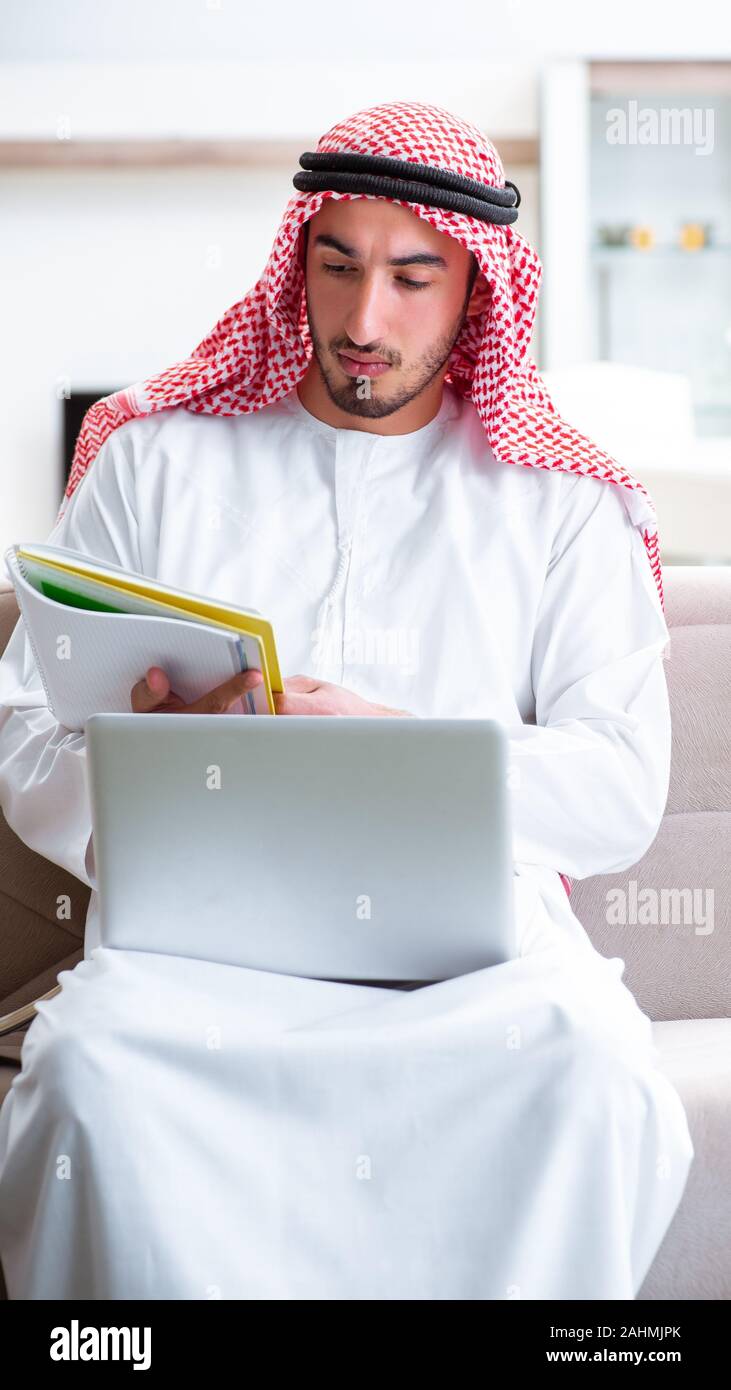 The arab man working at home on his work Stock Photo - Alamy