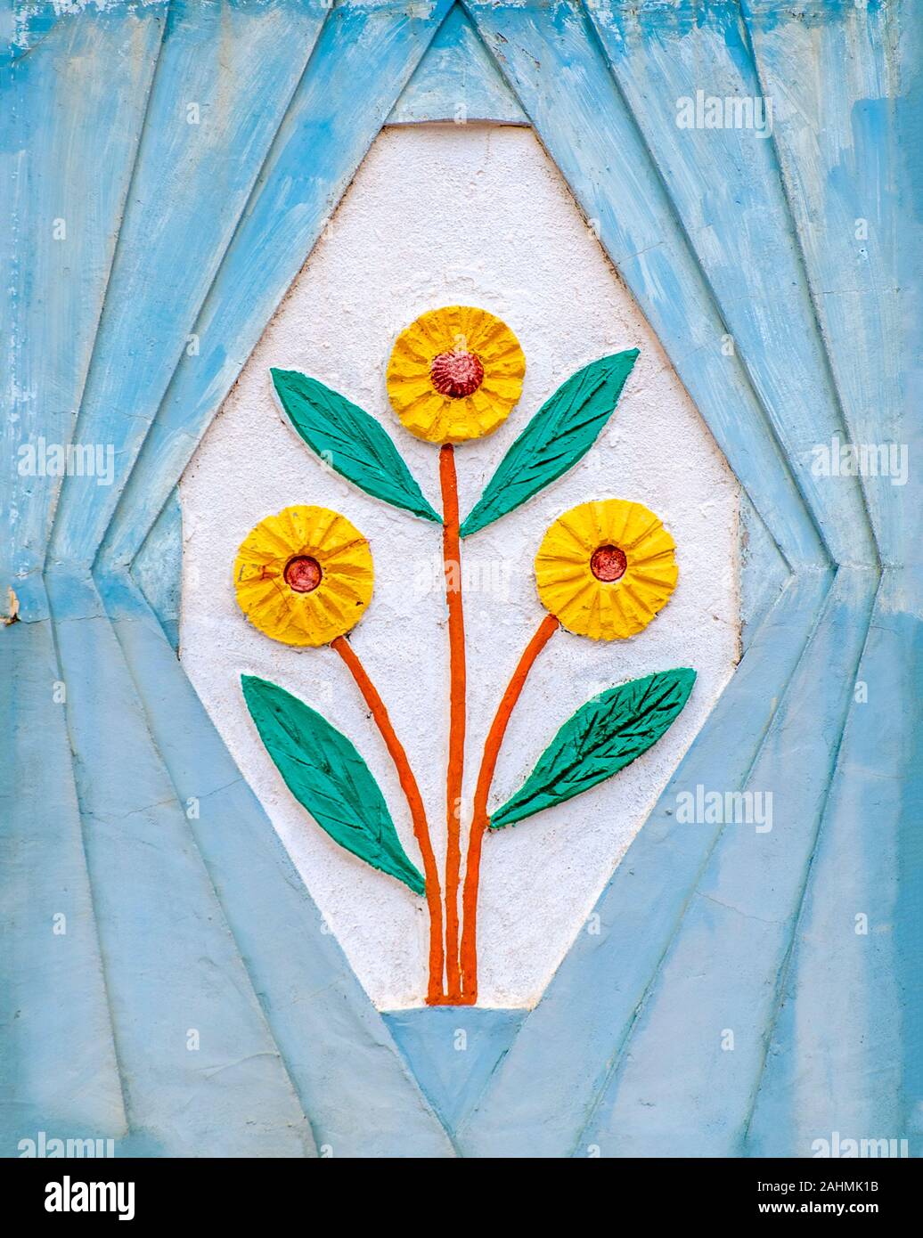 Colourful plaster floral design with a light blue background ...