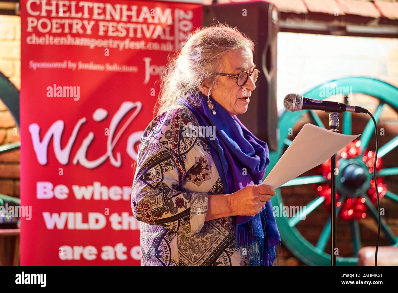 Poet Angela France reading at the launch of the 2019 Cheltenham Poetry ...