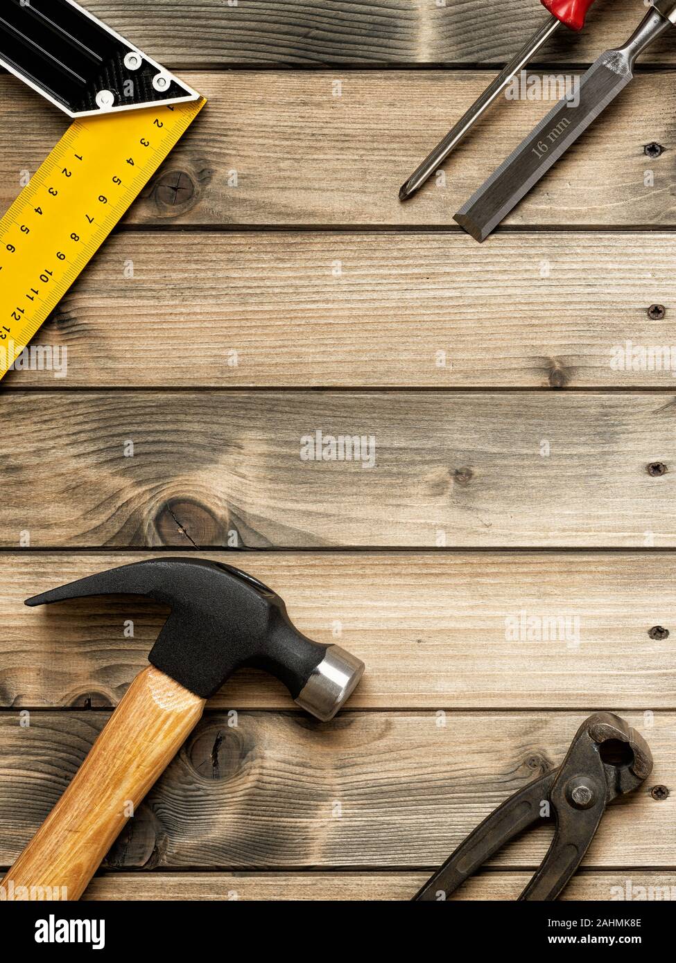 Top view of carpenter work tools on an antique wooden table ...