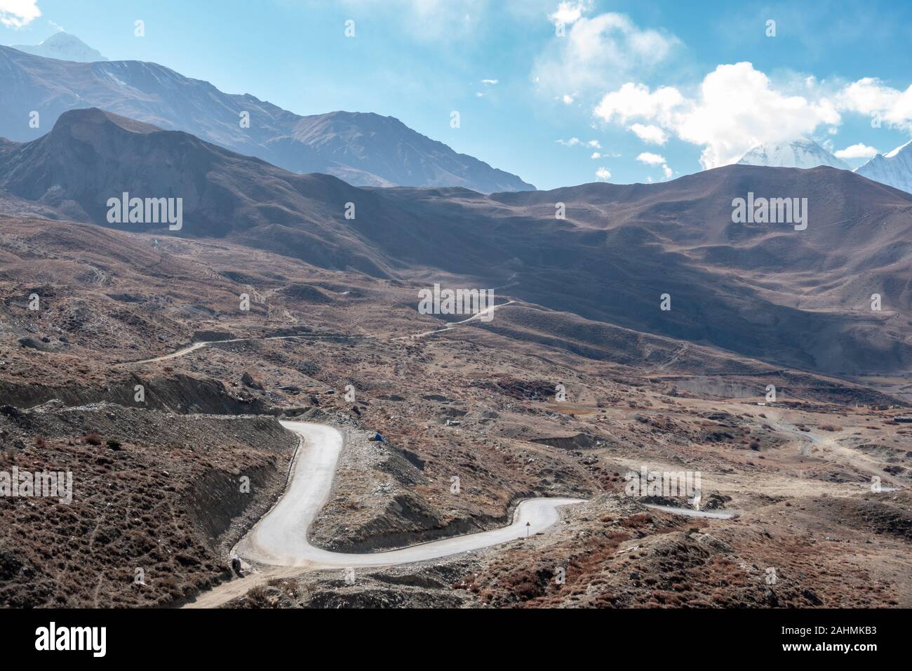 A winding road in the Himalaya countryside of northern Nepal Stock Photo - Alamy