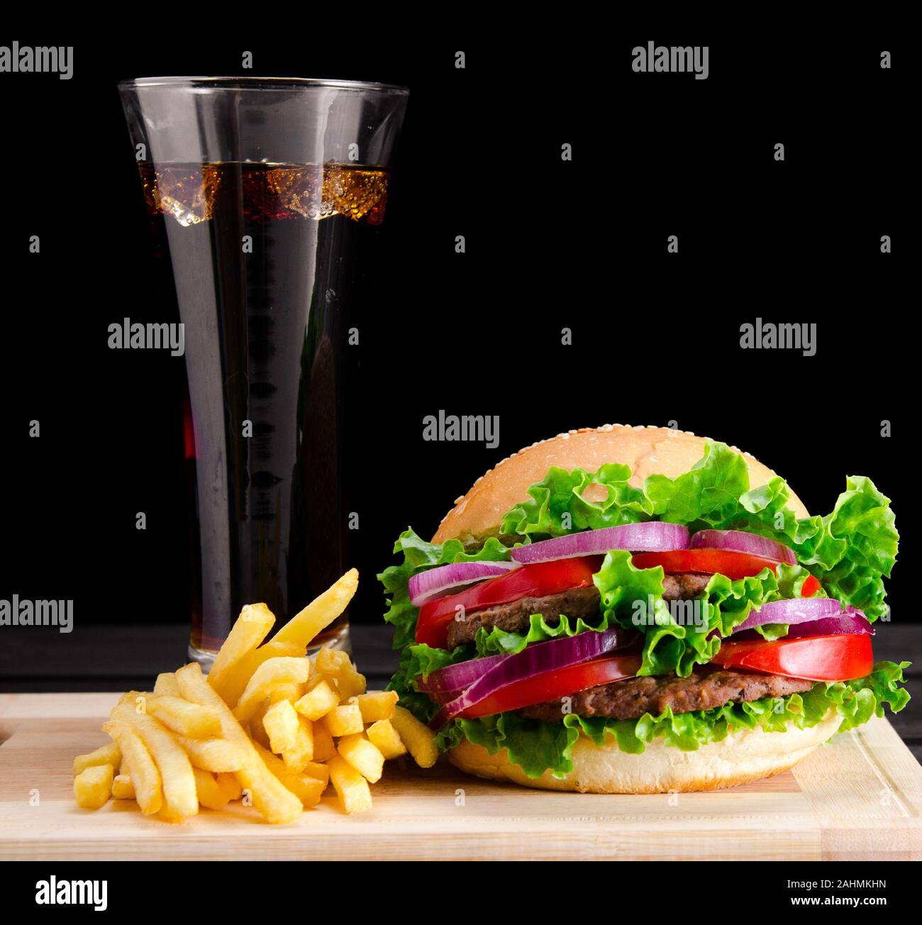 The burger served in bun in nutrition fast food concept Stock Photo - Alamy