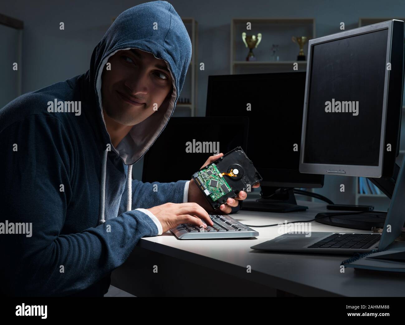 The hacker hacking computer at night Stock Photo - Alamy