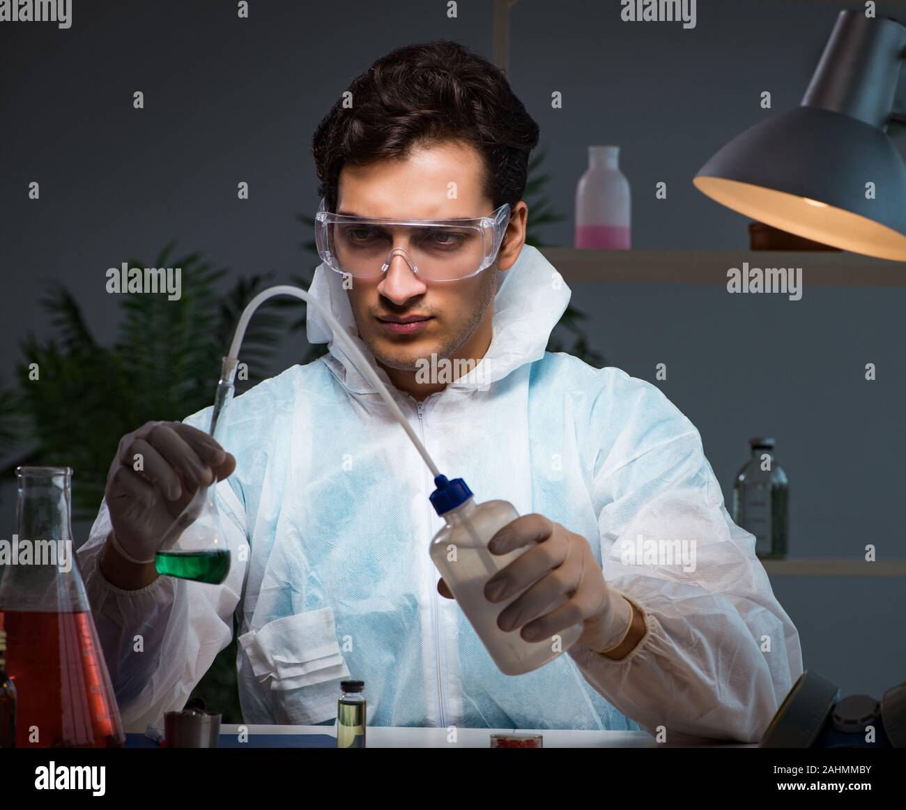 Young male chemist late hi-res stock photography and images - Alamy