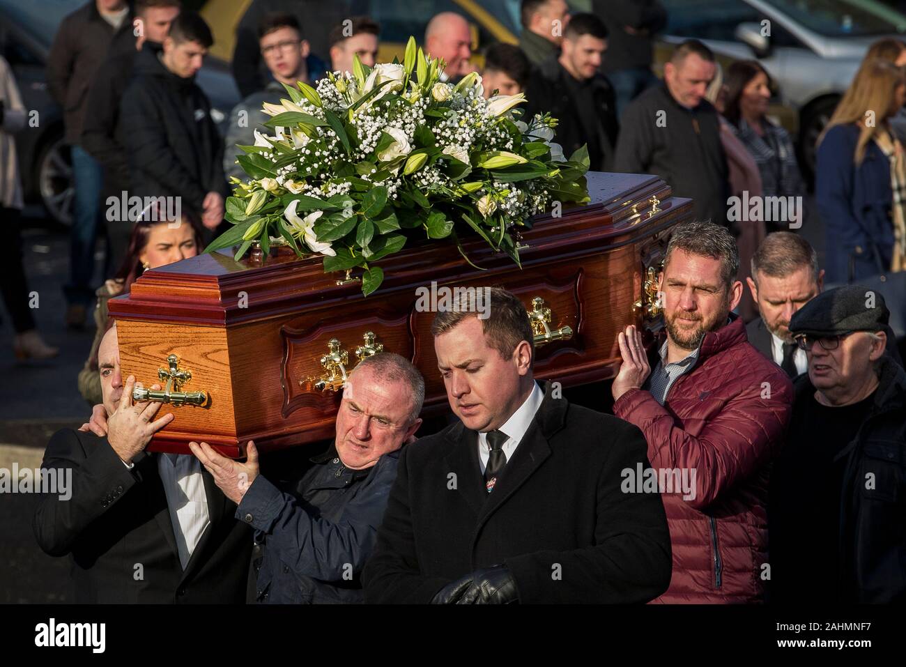 Pallbearers carry the coffin of stabbing victim Joseph (Joe) Dutton ...