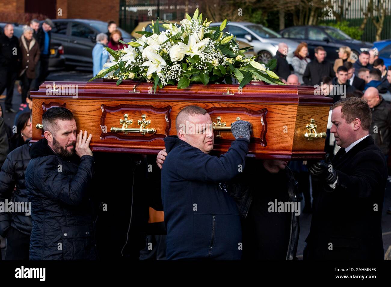 Pallbearers carry the coffin of stabbing victim Joseph (Joe) Dutton ...