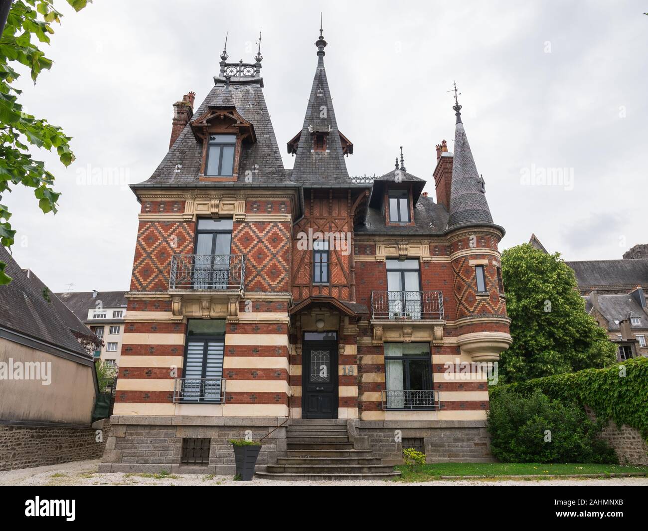 June 2019. Beautiful french mansion made of stone & bricks in a town ...