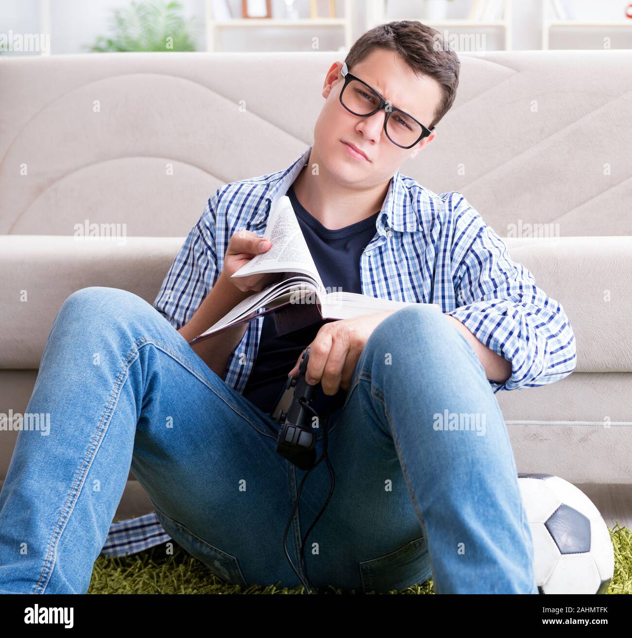 Boy trying to balance books hi-res stock photography and images - Alamy