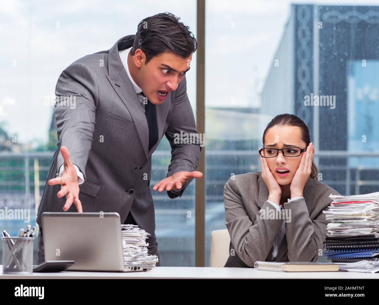 The boss yelling at his team member Stock Photo - Alamy