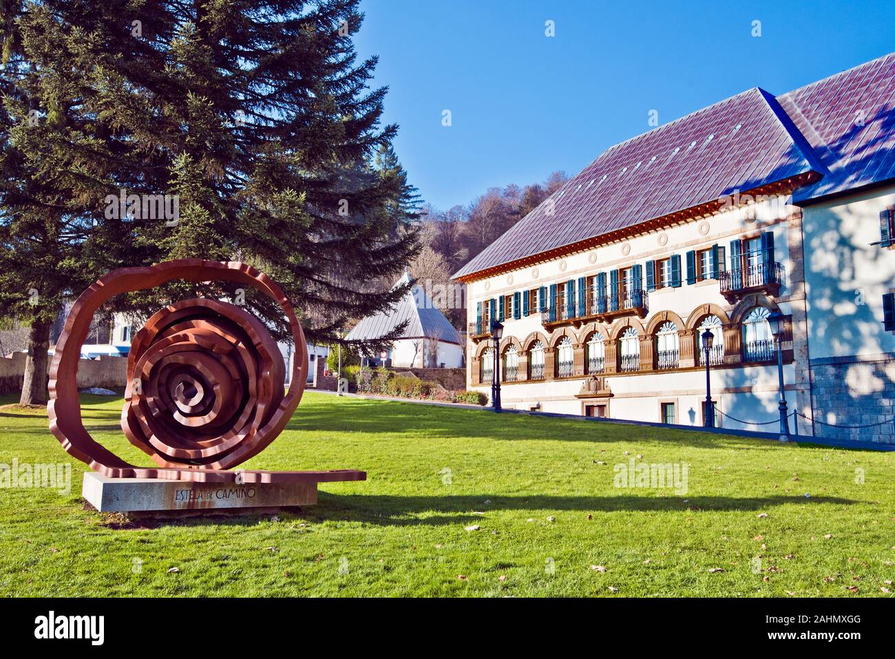 View of Royal Collegiate, religious building in Roncevaux village in ...