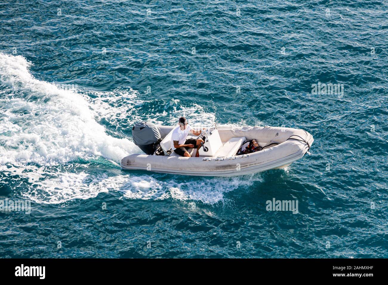 Man in dingy hi-res stock photography and images - Alamy