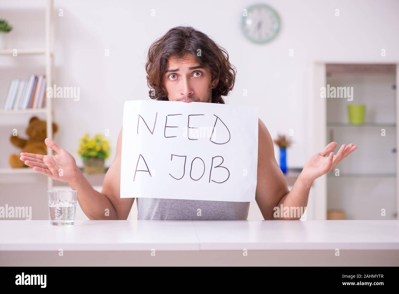 The unemployed man desperate at home Stock Photo - Alamy