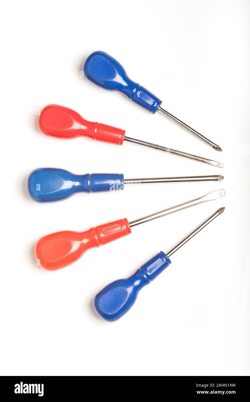 An array of red and blue handled screwdrivers for slotted and Phillips ...