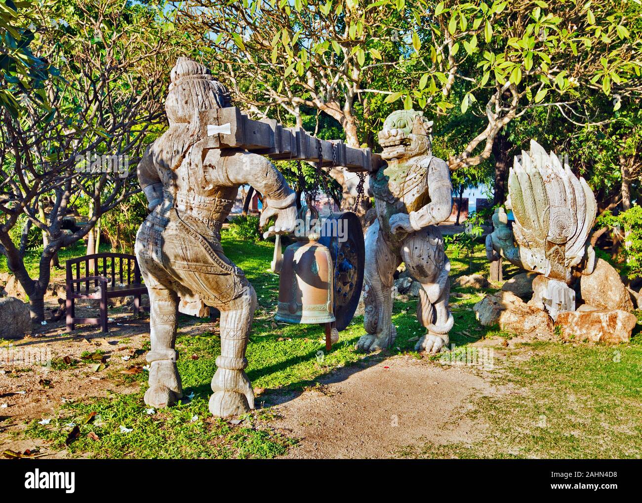 Temple bell in Sanctuary of truth in Pattaya carried by two sculptured ...