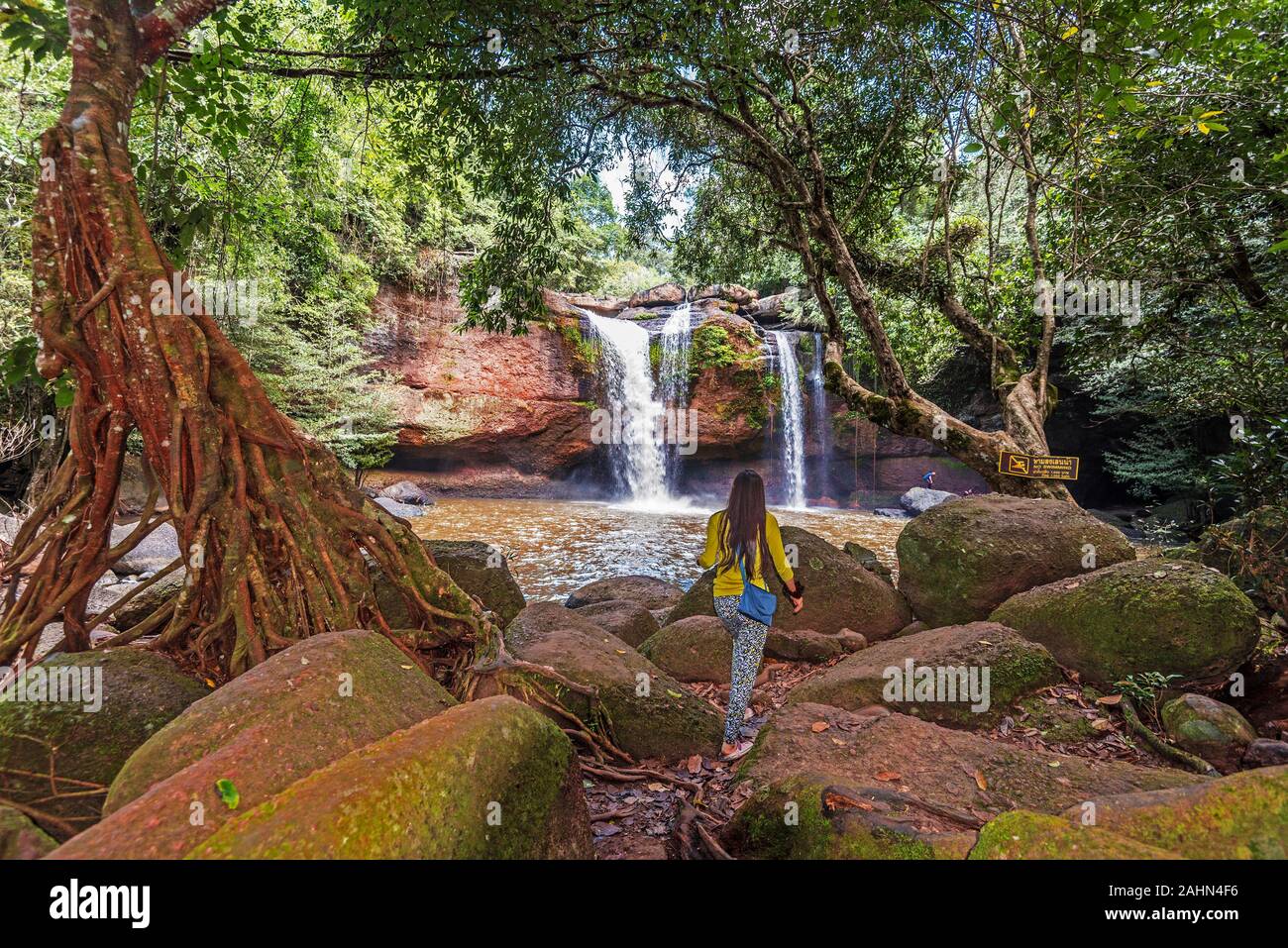 Women approaching Haew Suwat Waterfall trough in Khao Yai National Park ...