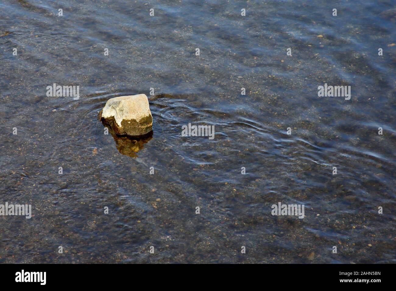 Water flowing into a rock hi-res stock photography and images - Alamy