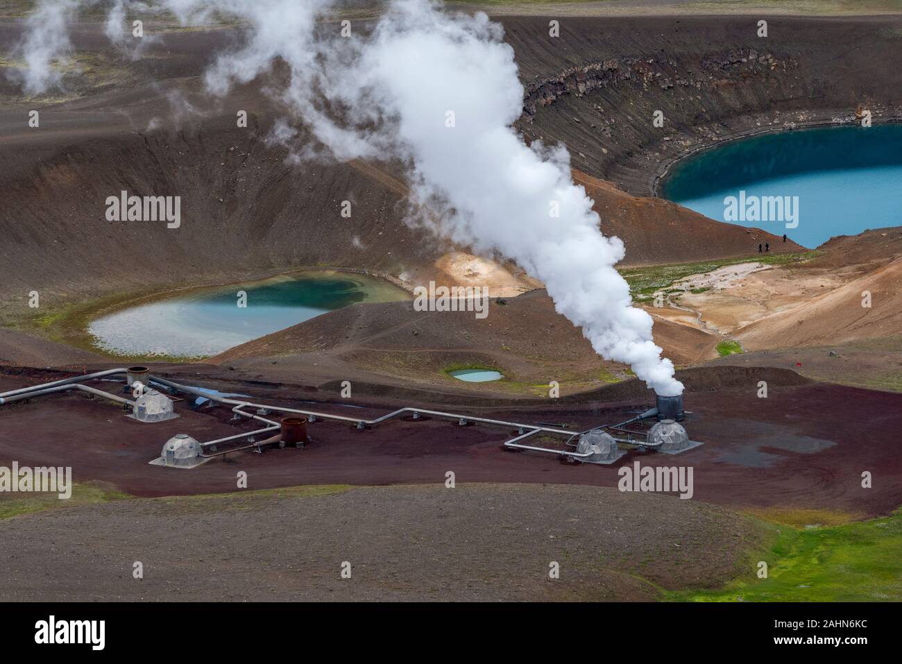View at active steam stack and parts of Krafla geothermal power plant ...
