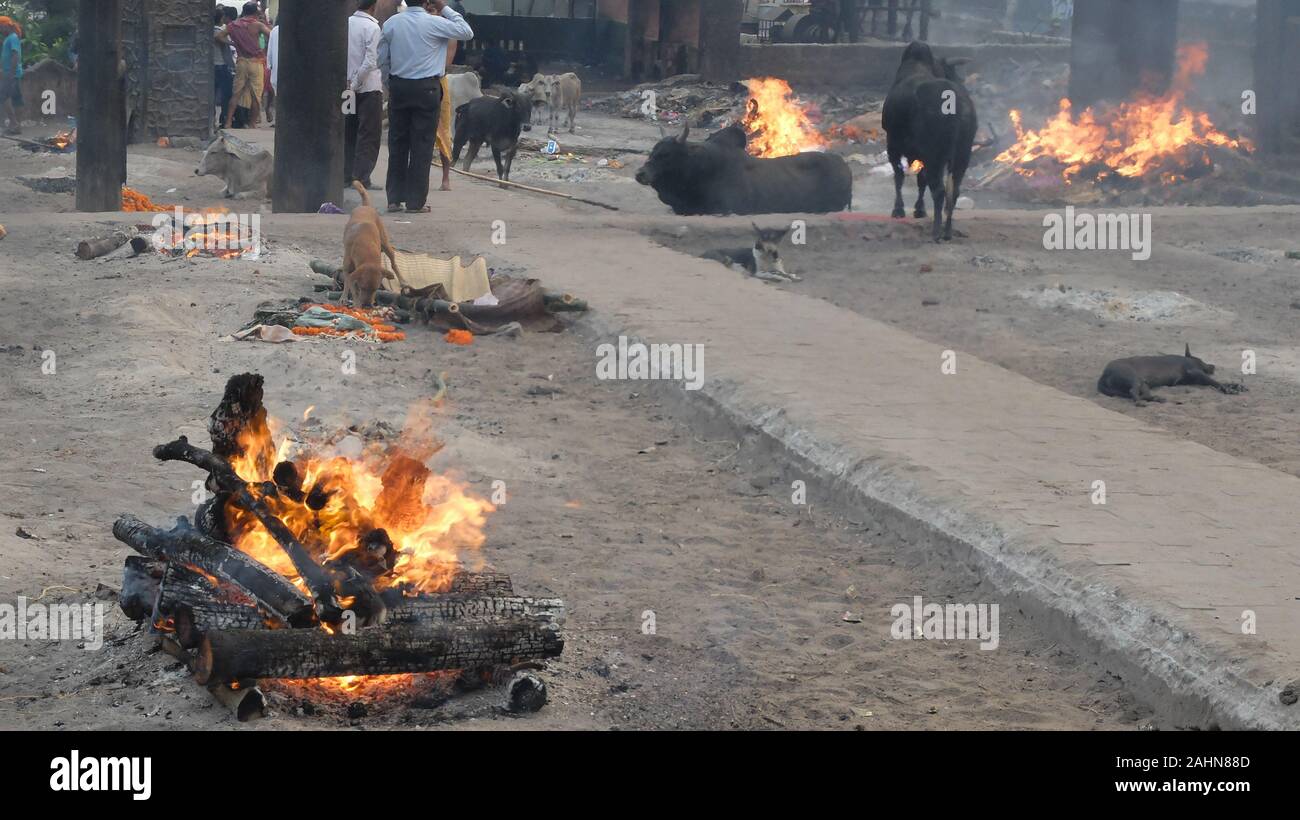 PURI,ODISHA STATE/INDIA-MARCH 12 2018:Funeral pyres burn at Swargadwar ...