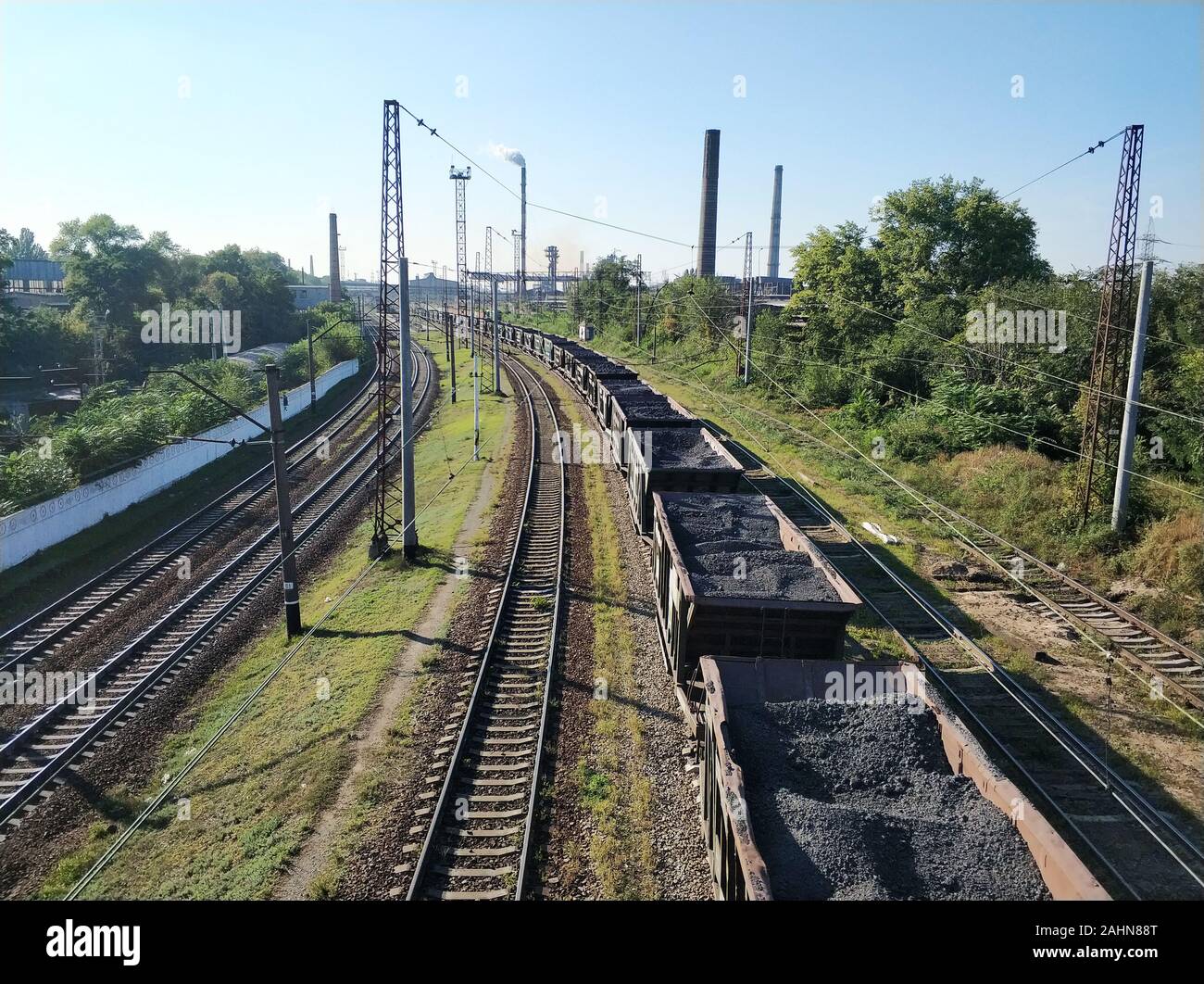 Railway. Freight wagons carrying different loads. Heavy industry ...
