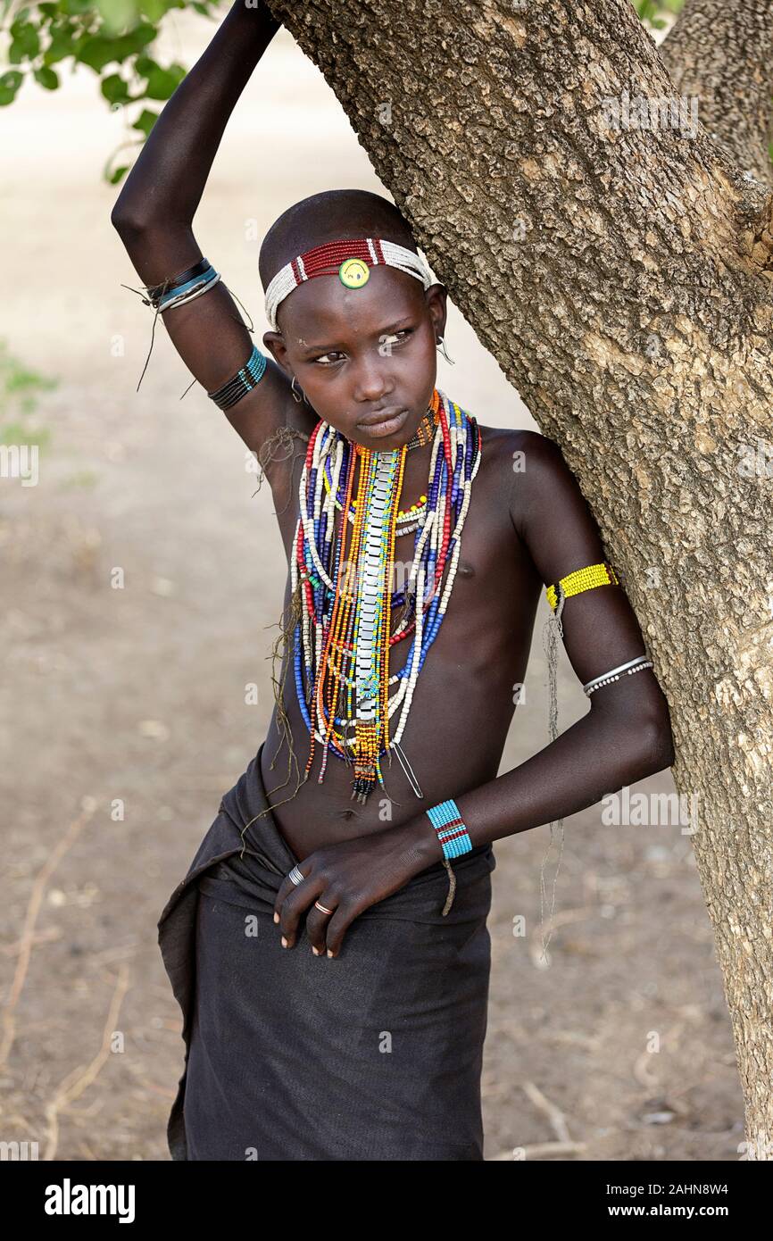 beautiful Arbore girl leaning on a tree, Omo valley, Ethiopia Stock ...
