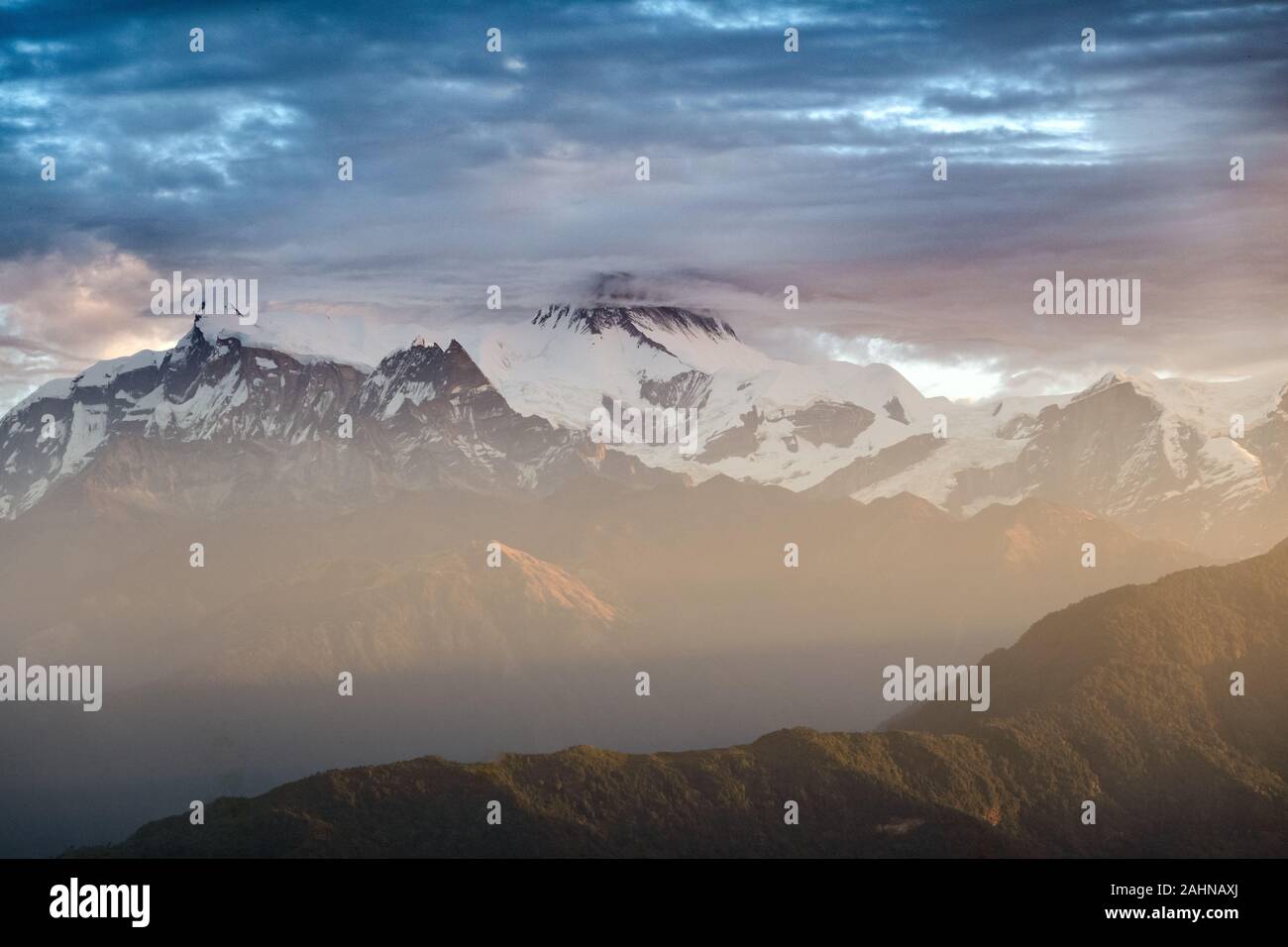 The beautiful colors of the morning light shining on the Himalaya ...