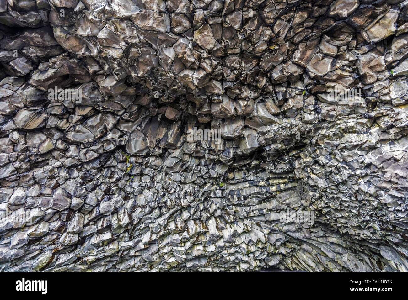 Basalt cliffs pattern inside the cave in the bottom of Reynisfjall ...