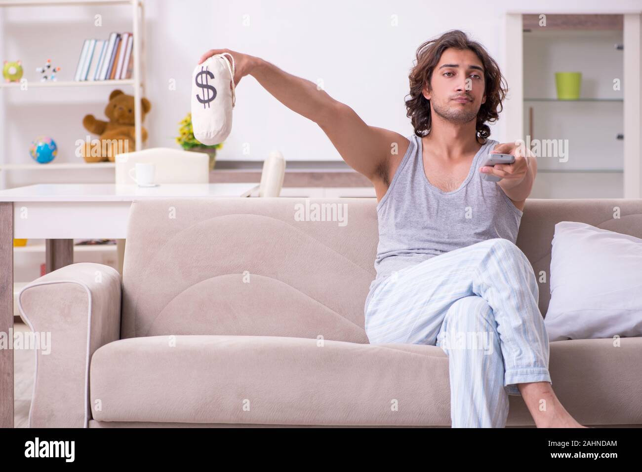 The unemployed man desperate at home Stock Photo - Alamy