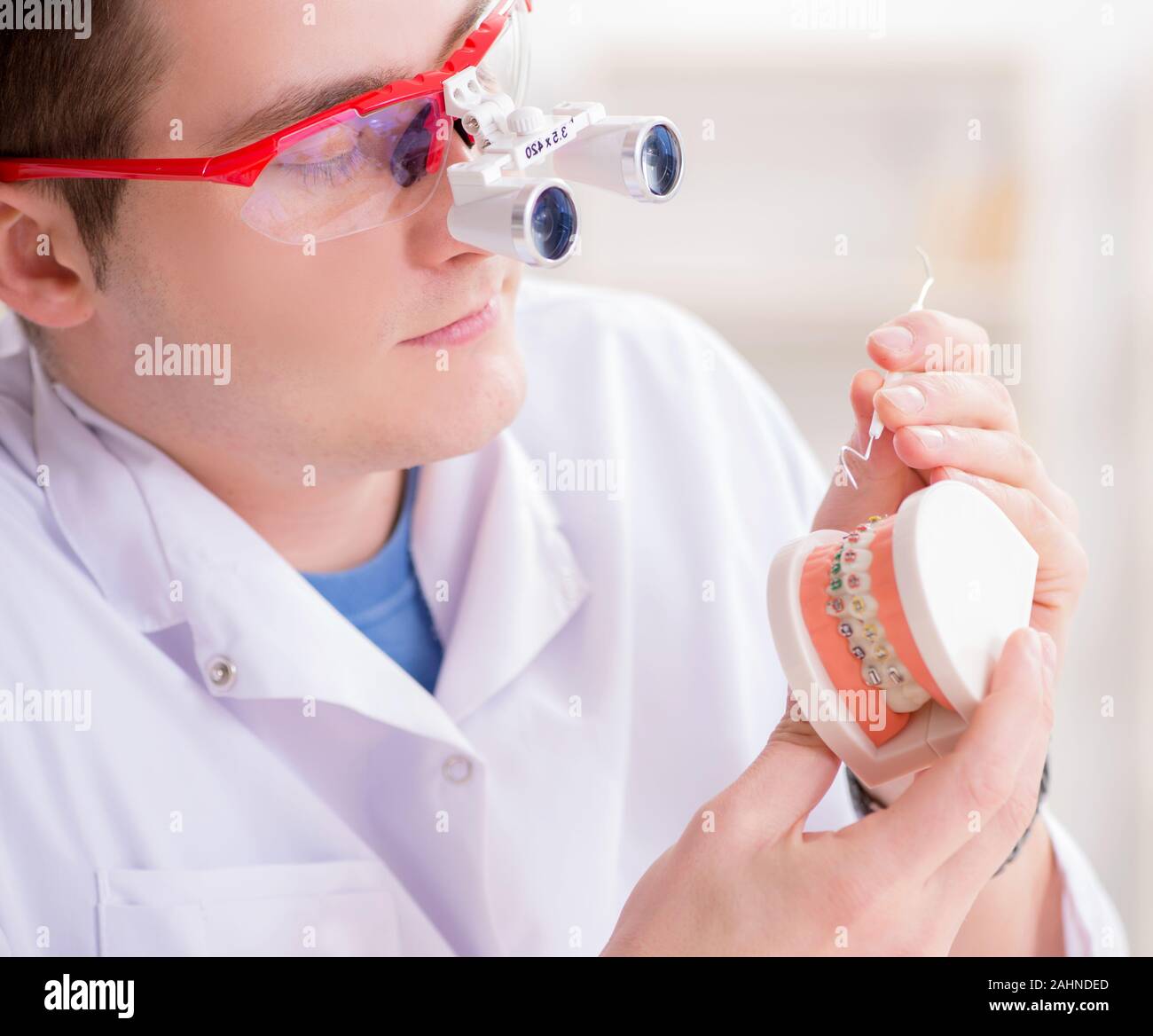 The dentist working teeth implant in medical lab Stock Photo - Alamy