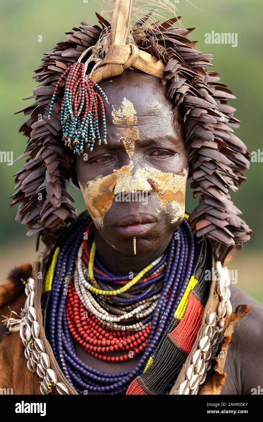 Karo tribe, Omo valley, Karo man with painted face and decorated head ...
