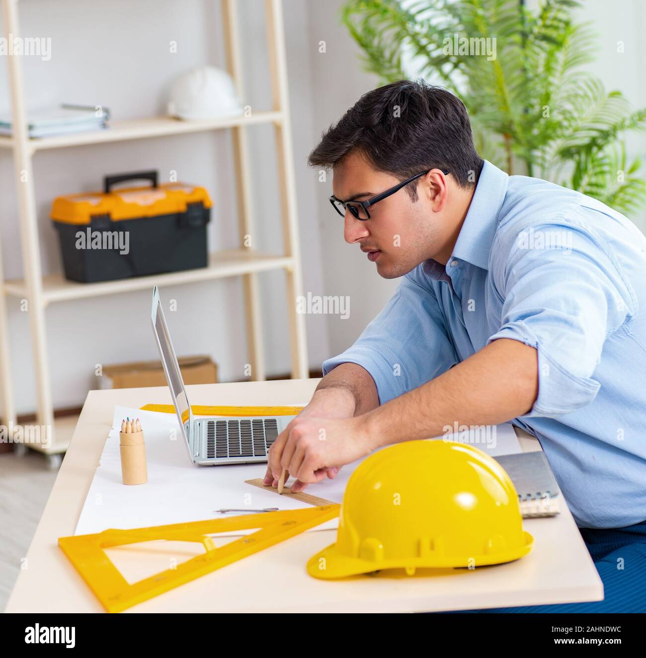 The construction engineer working on new project Stock Photo - Alamy