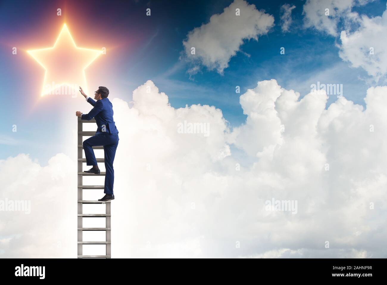 The businessman reaching out for stars Stock Photo - Alamy