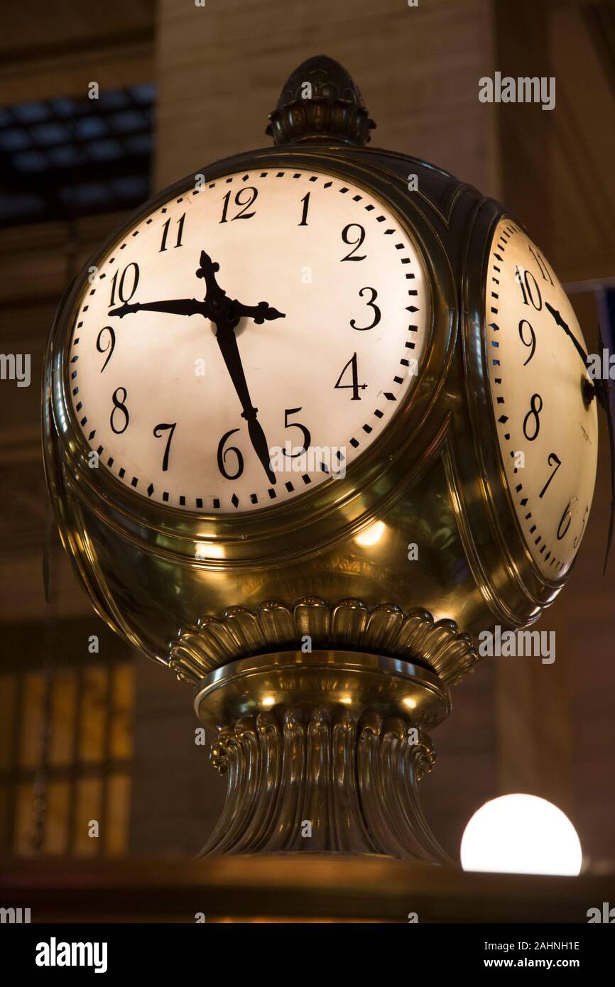 Iconic four-faced brass clock atop the information booth at Grand ...
