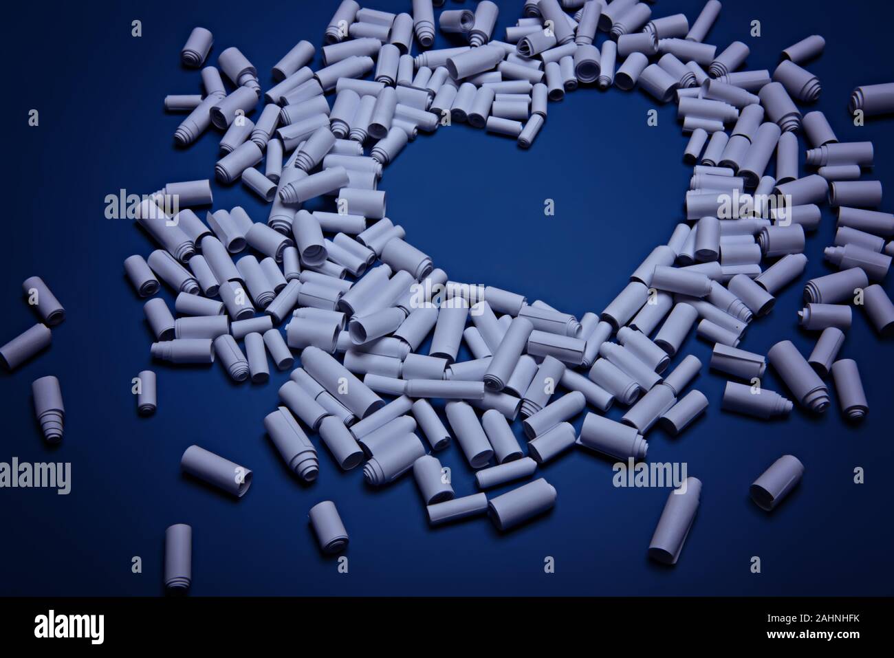 A lot of small scrolls of fortune-telling papers on a classic blue ...