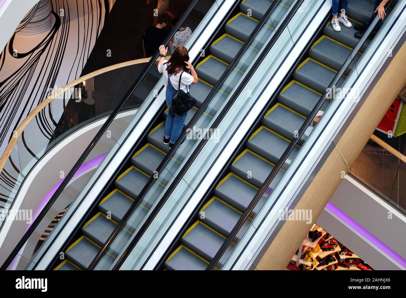 Modern shopping mall. People in rush. Escalator in a shopping center. Interior of mall Stock ...