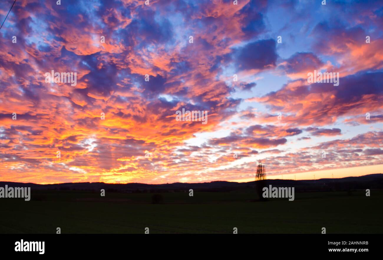 A very extraordinary and beautiful sunset in orange and purple colours ...