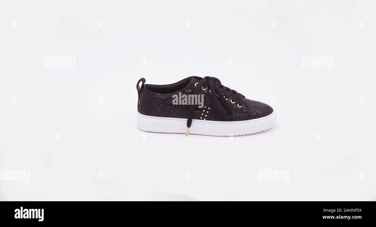 Women single sneaker isolated on white background with clipping path ...