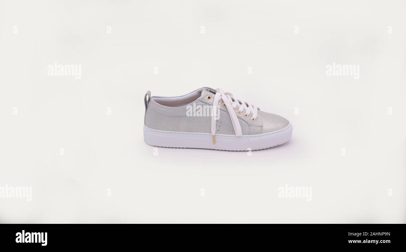 Women single sneaker isolated on white background with clipping path ...