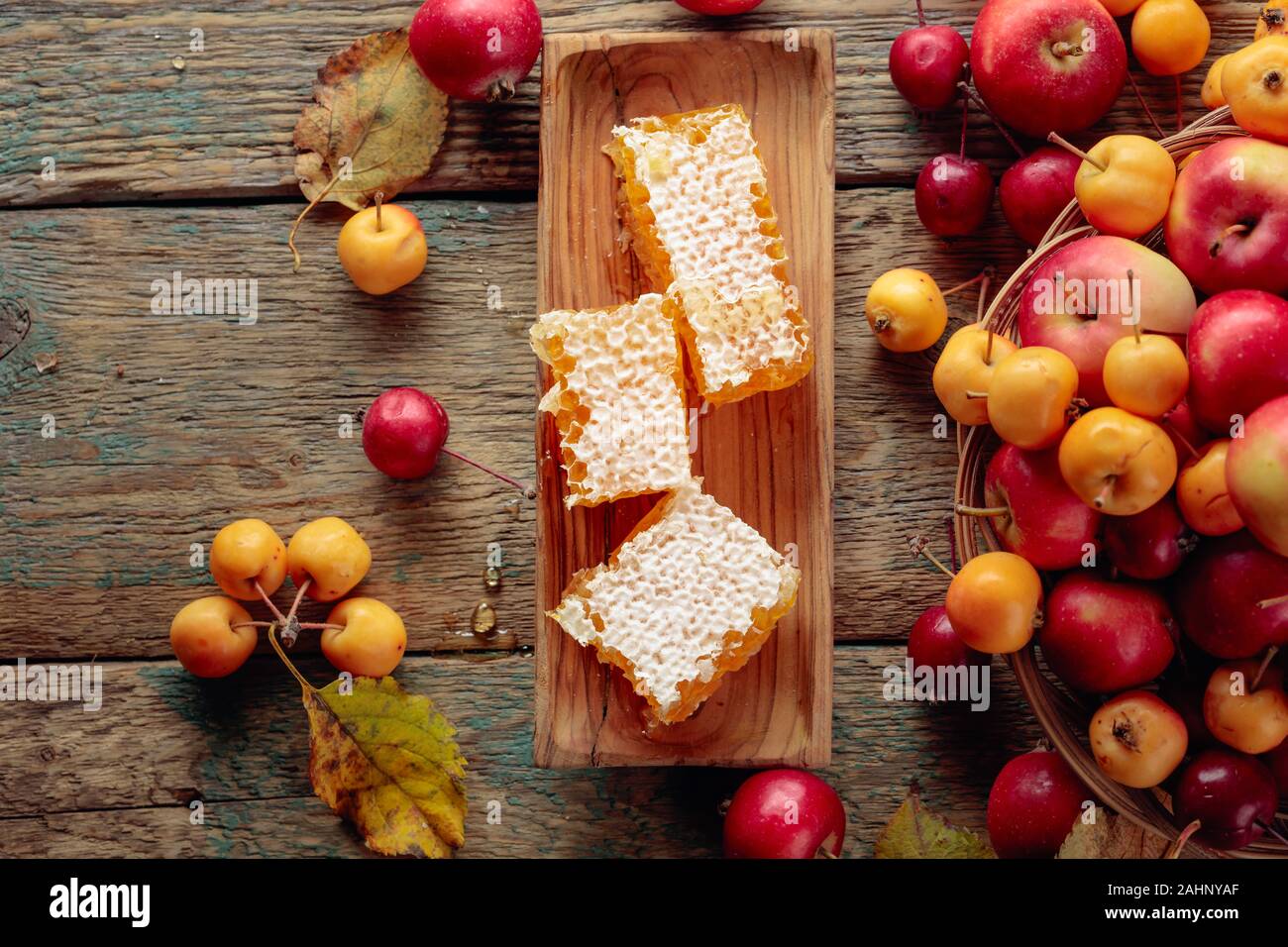 Honey and ripe small wild apples. Red and yellow crab apples, healthy ...
