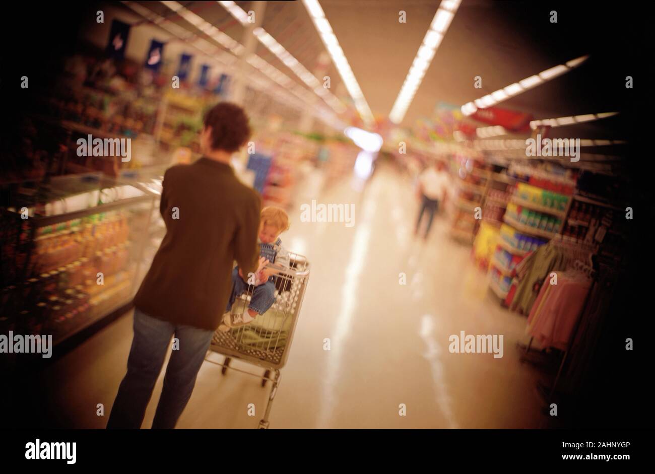 Sitting in push cart hi-res stock photography and images - Alamy
