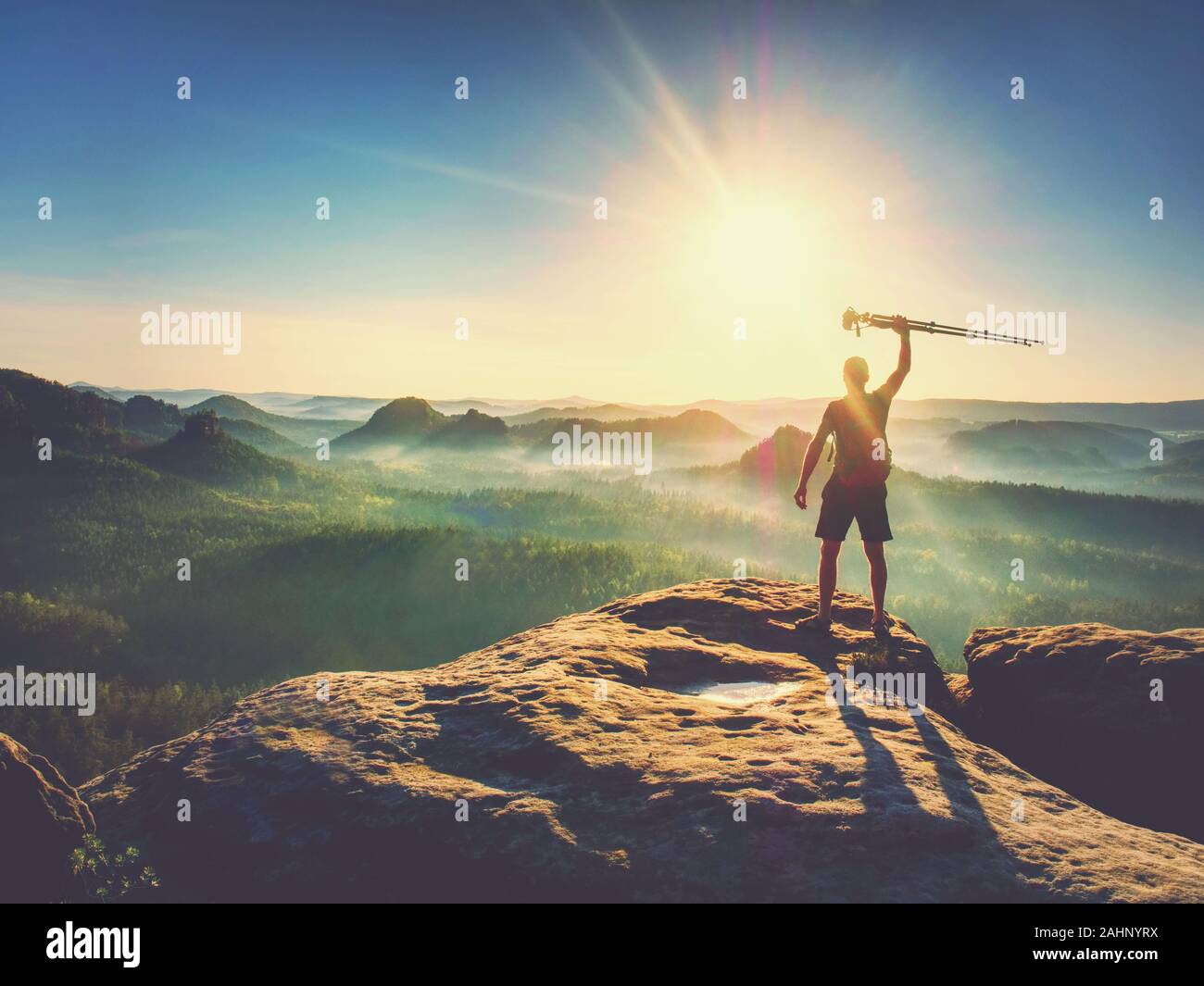 Photographer taking travel nature photography. Tall man photographer ...