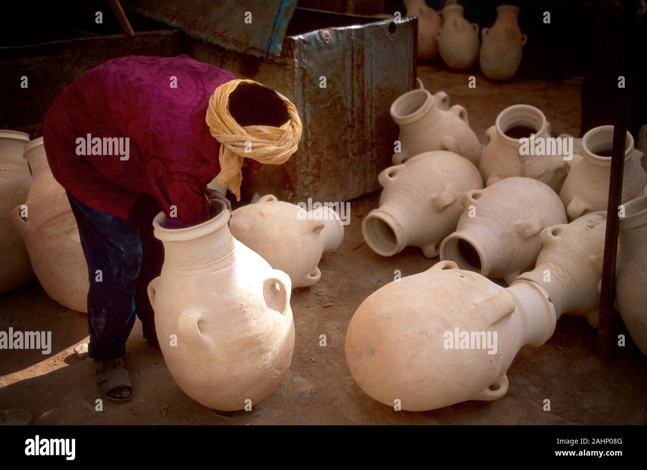 A potter is checking a pot Stock Photo - Alamy