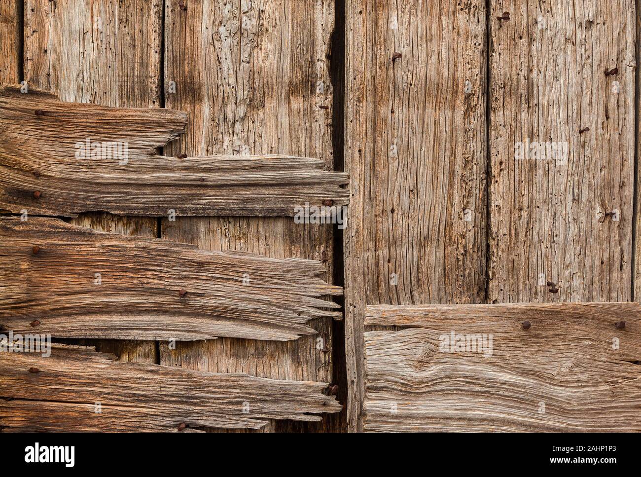 Old wooden boards with iron nails, holes and worn varnish background ...