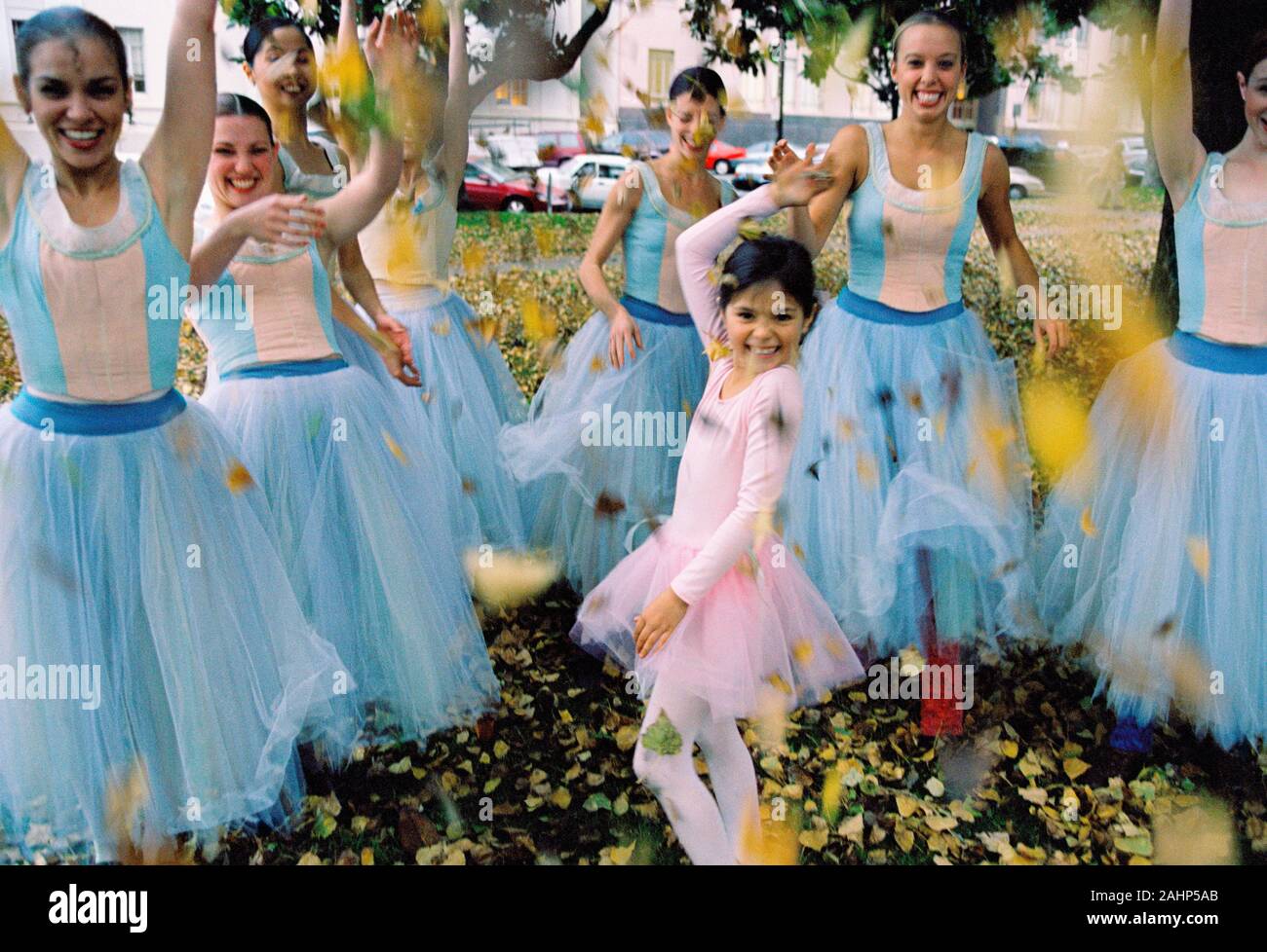 Group of ballet dancers having fun in a park in autumn Stock Photo - Alamy