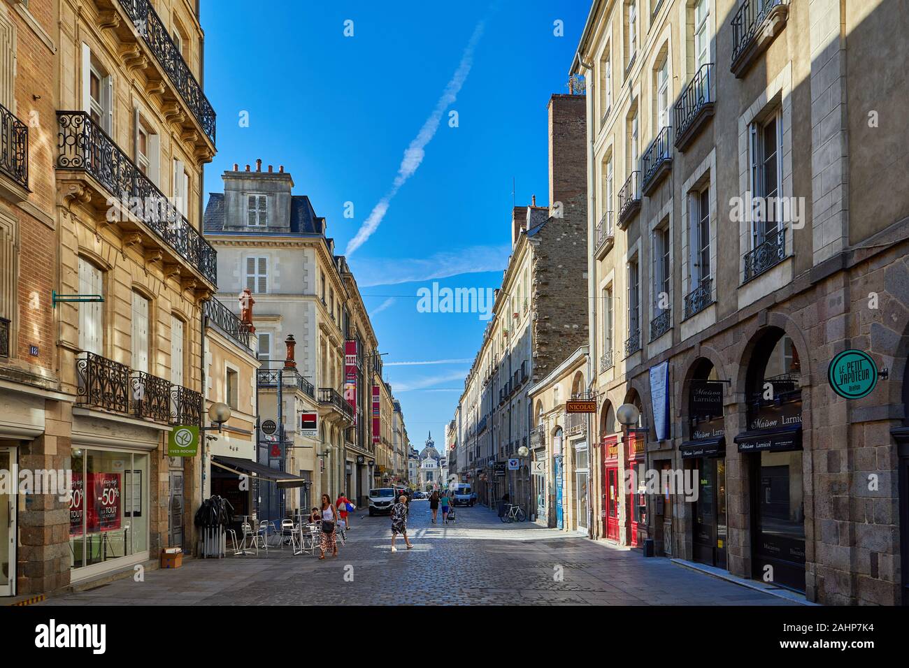 Cobbled Street view of Rue le Bastard with the Palais du Commerce at ...