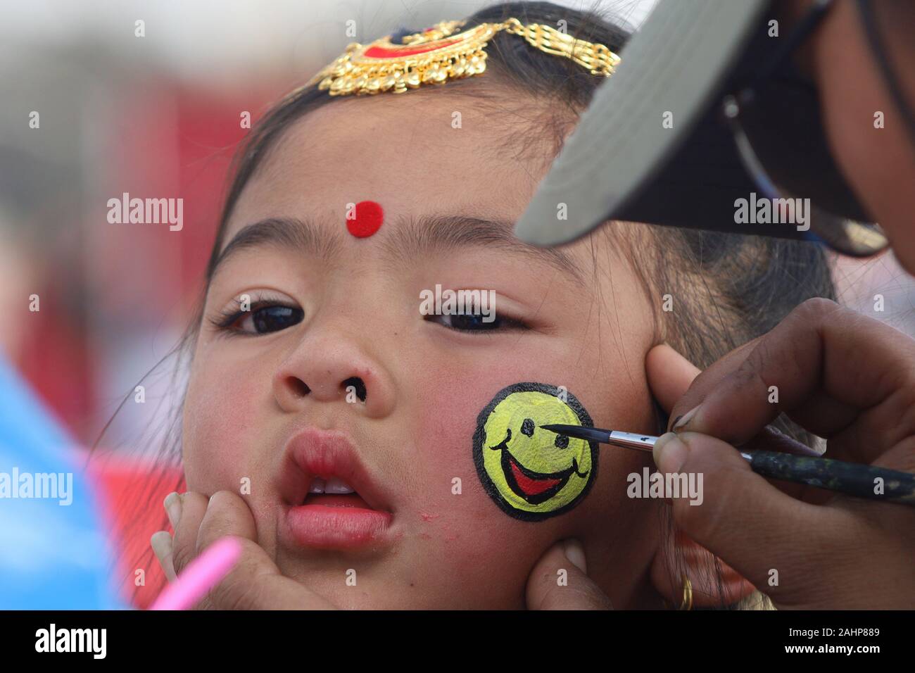 Kathmandu, Nepal. 31st Dec, 2019. A kid from ethnic Gurung community ...